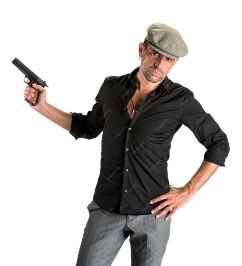 Premium Photo Handsome Man In Cap With A Gun