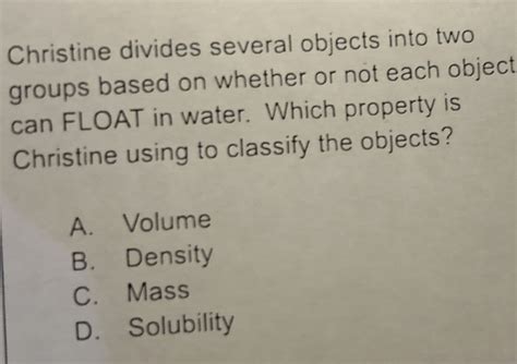 solved christine divides several objects into twogroups