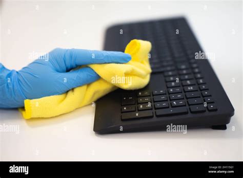 Cleaning The Surface Of The Keyboard Stock Photo Alamy