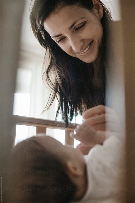 Mother Playing With Her Baby By Stocksy Contributor Aleksandar Novoselski Stocksy
