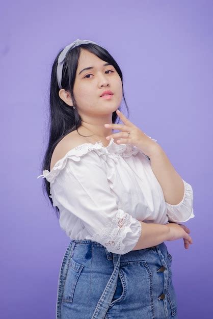 Premium Photo Chubby Asian Woman Isolated On Purple Background