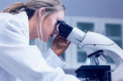 Science Babe Looking Through Microscope In The Lab At The University Science Babe
