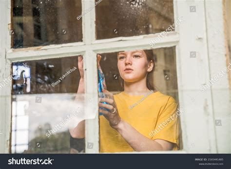 Serious Girl Cleaning Windows Doing Her Stock Photo Shutterstock
