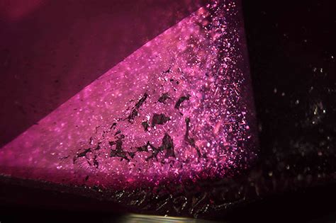 Two Unusual Natural Sapphires With Synthetic Ruby Overgrowth Gems And Gemology