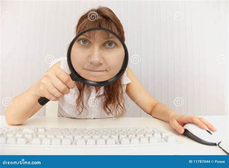 The Amusing Girl With The Computer Keyboard And A Stock Photo Image Of Focus Magnifier 11787044