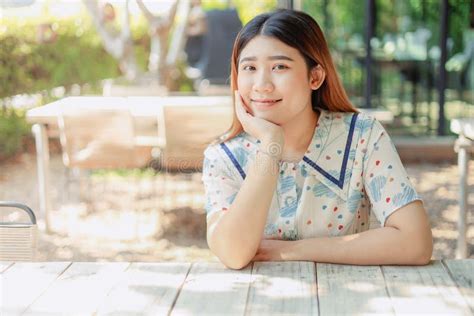 Asian Cute Young Innocent Asian Teen Portrait Smile Sitting Relax