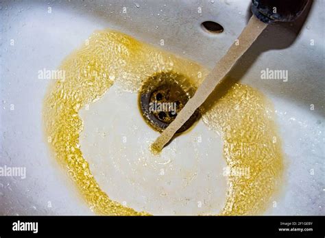 Rusty Water Flows From The Bathroom Tap Problem Concept Dirty Water Supply Stock Photo Alamy