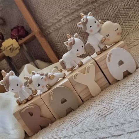 خرید و قیمت استند مکعبی چوبی ب همراه مجسمه یونیکورن از غرفه گالری کودک