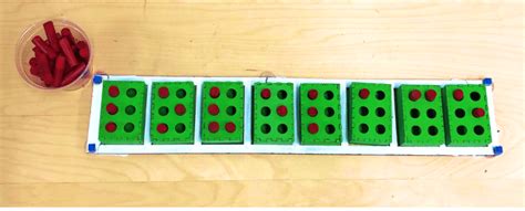 tangible blocks from the brailleblocks prototype wooden blocks and