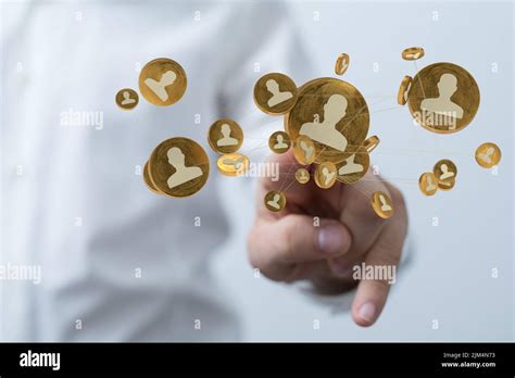 Hand Pointing At 3d Digital Rendering Of Icons Of People Connecting Together Concept Of Social