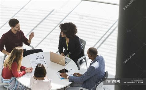 Business People Talking In Conference Room Meeting — Togetherness
