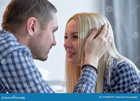 The Guy Gently Stroking The Girl`s Head The Girl Smiles Stock Image