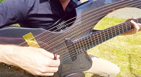 Man Pays Tribute To Chester Bennington With Harp Guitar Cover Of Numb