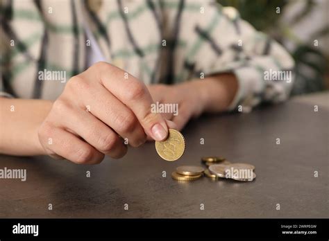 Woman Counting Coins Hi Res Stock Photography And Images Alamy