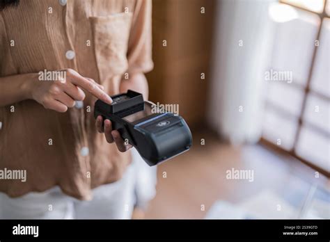 Contactless Payment Holding Credit Card With Touch Settlement Paying