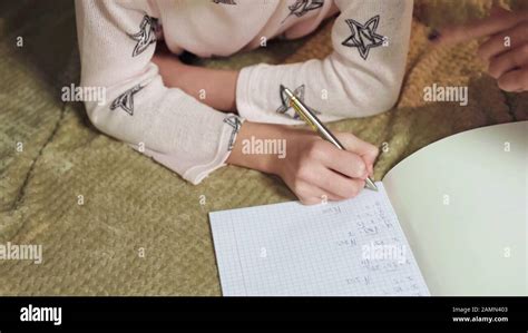 Smart Girl Solving Mathematical Equations In Bed Homeschooling