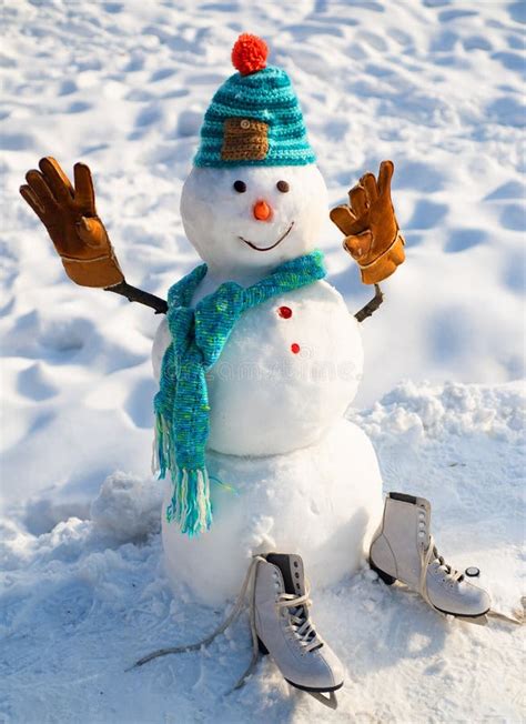 The Snowman Is Wearing A Fur Hat And Scarf Christmas Snowman Close Up