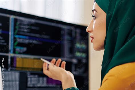 Stock Foto „confused Muslim Coder Looking At Programming Code And Trying To Understand Why It