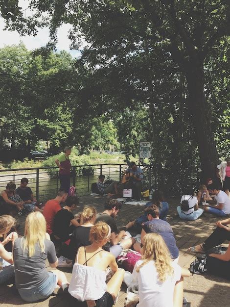 Premium Photo Woman Sitting On Tree Stump