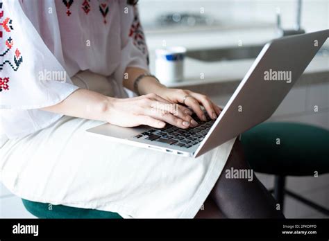 Woman S Hand Touching Computer Stock Photo Alamy