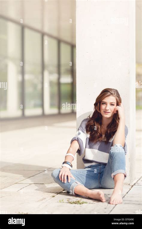 Attractive Young Brunette Woman Barefoot In Summertime Outdoor Stock
