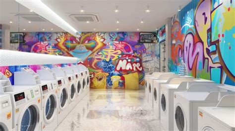 Colorful Urban Laundromat With Vibrant Wall Art And Modern Washing