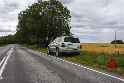 A Car Waiting For Repair After A Breakdown A Broken Car On The Side Of