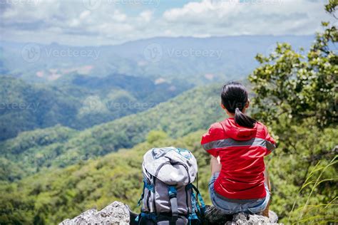 Young Person Hiking Female Sitting On Top Rock Backpack Woman Looking