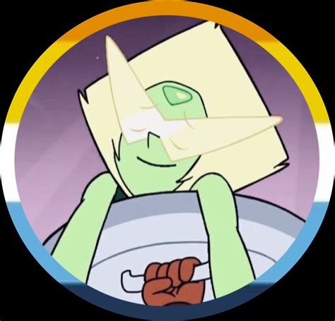 Peridot Smiling With Her Eyes Closed While Laying On A Metal Cover With A Circular Border The