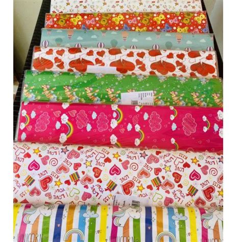 กระดาษห่อของขวัญ คละลาย 1 แพค มี 50 แผ่น มีเก็บเงินปลายทาง Shopee Thailand