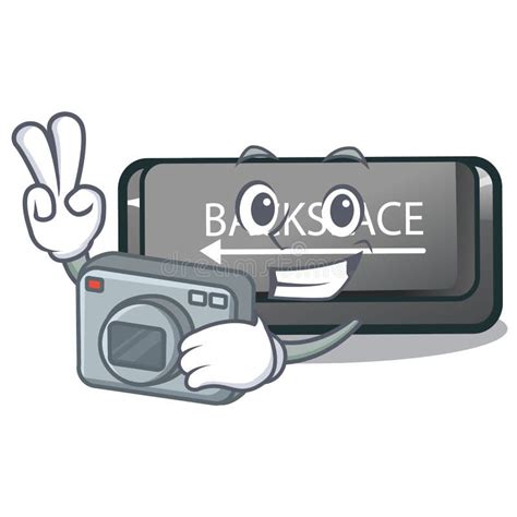 photographer backspace button installed on cartoon keyboard stock