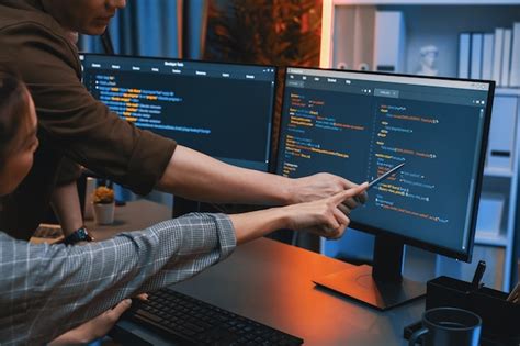 premium photo it developers discussing with point website coding