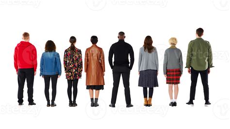 Diverse Group Of Eight People Standing In A Line Facing Away From The