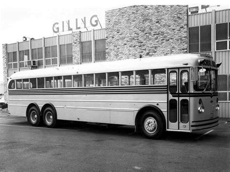 1970 Gillig School Bus Parked In Front Of A Building
