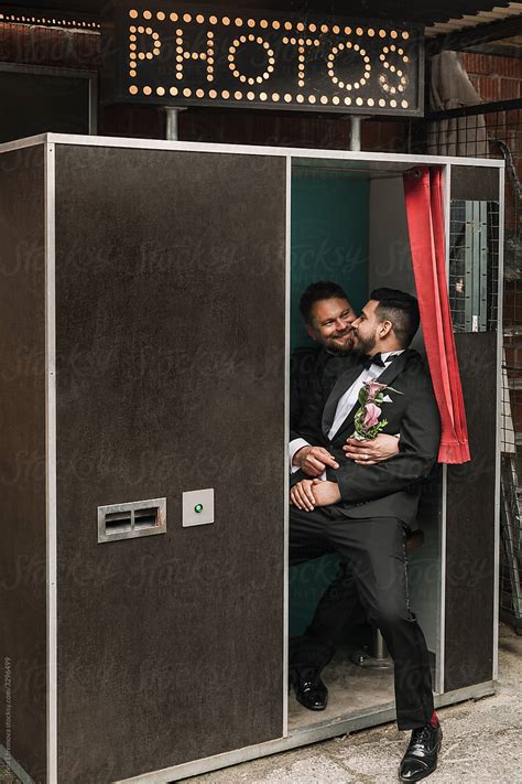 Gay Couple In A Photo Booth By Stocksy Contributor Irina Efremova