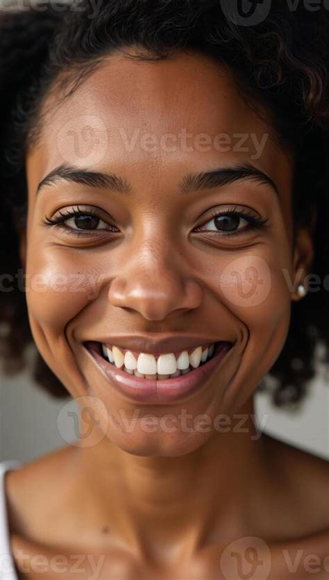 Highquality Portrait Featuring A Smiling African American Woman In Her
