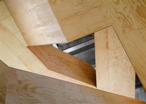De Burgemeester Office With Angular Wooden Staircase By Studioninedots