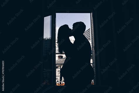 Shadow Of Young Passionate Couple Two Lovers In The Dark Kissing For