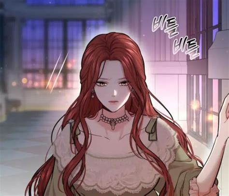 A Woman With Long Red Hair Standing In Front Of A Building