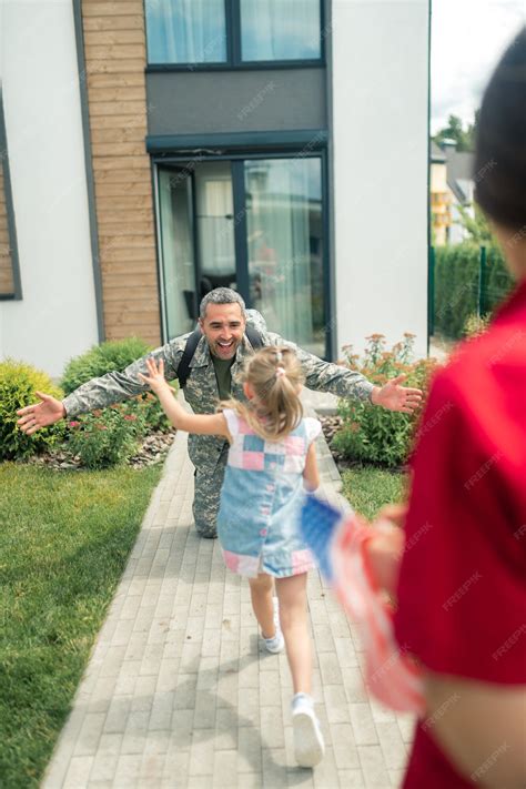 Premium Photo Father Returning Home Happy Father Returning Home To His Wife And Daughter