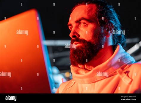 spaceship engineer using notebook device to fix security breach causing