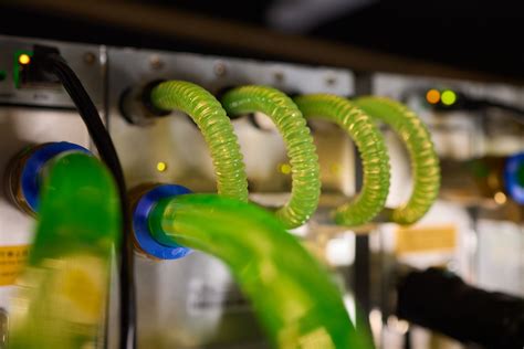 Revolutionizing Ai Data Centers The Synergy Of Liquid Cooling And Raised Access Floors For