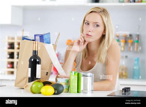 A Woman Writing Shopping List Stock Photo Alamy