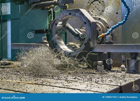 Processing Of Parts On A CNC Boring Machine Shavings Lie On The Machine Stock Photo Image Of