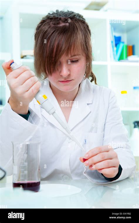 Girl With A Pipette Stock Photo Alamy