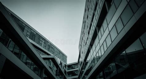 Modern Office Buildings With Angular Interconnected Structures Reach Upwards Stock