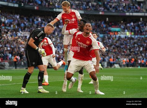 Left To Right Arsenals Aaron Ramsdale Martin Odegaard Eddie Nketiah And William Saliba