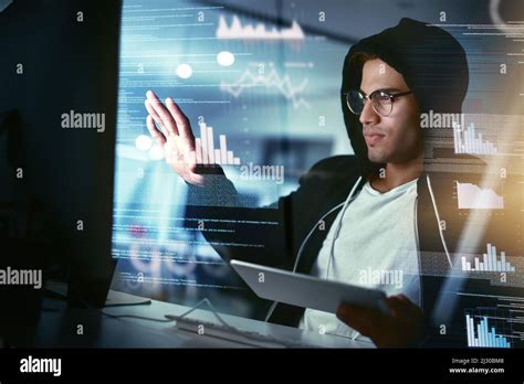 Hackers Are The Masters Of Stealth Shot Of A Young Hacker Cracking A