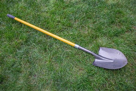 Shovel In Grass