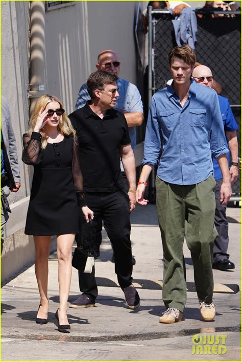 Emma Roberts Holds Hands With Boyfriend Cody John As She Arrives At